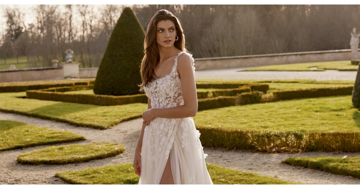 Abito collezione Justin Alexander in pizzo con scollo quadrato